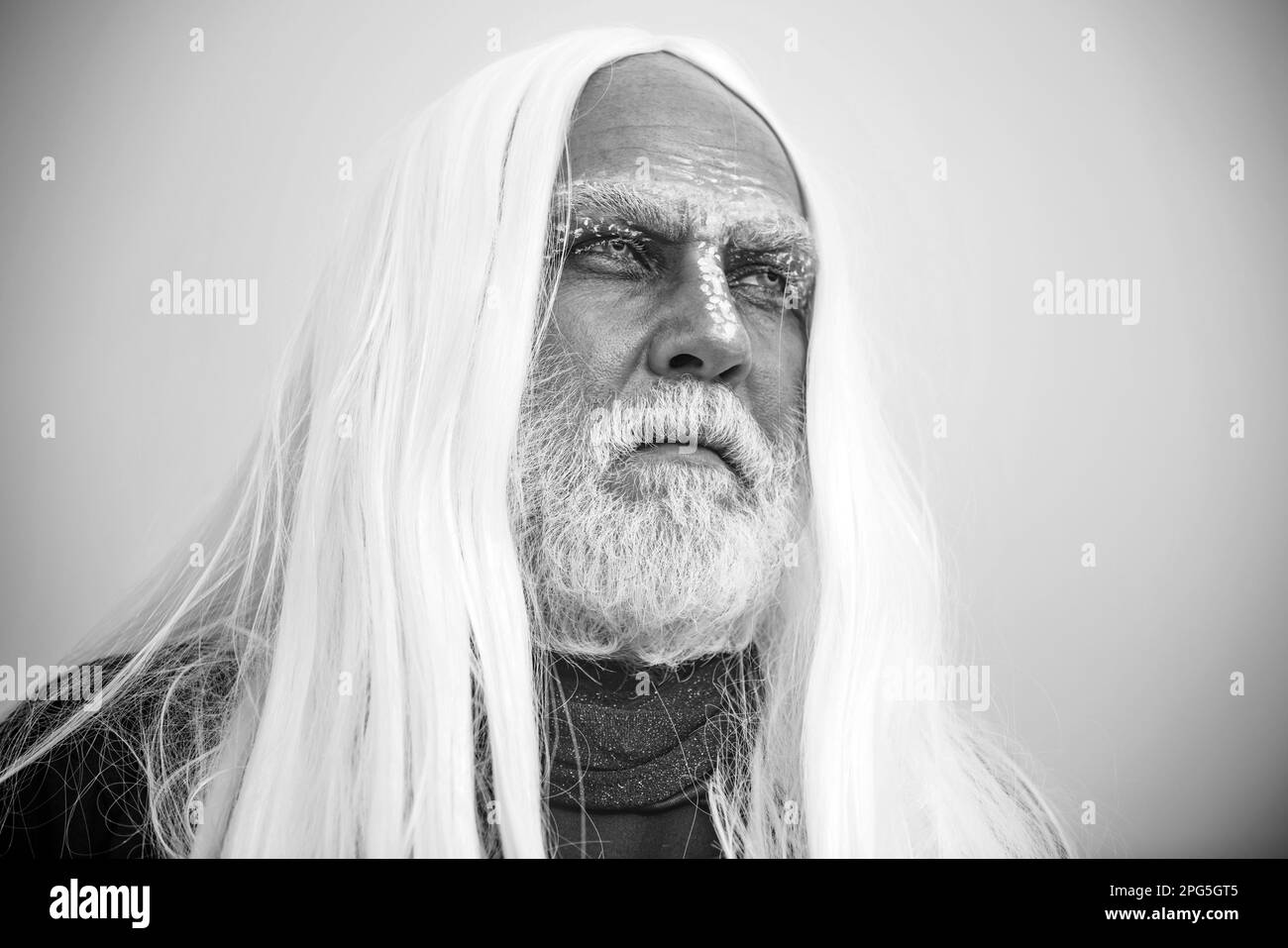 Scary Halloween man in hat - studio shot close-up. Bloody skin for ...