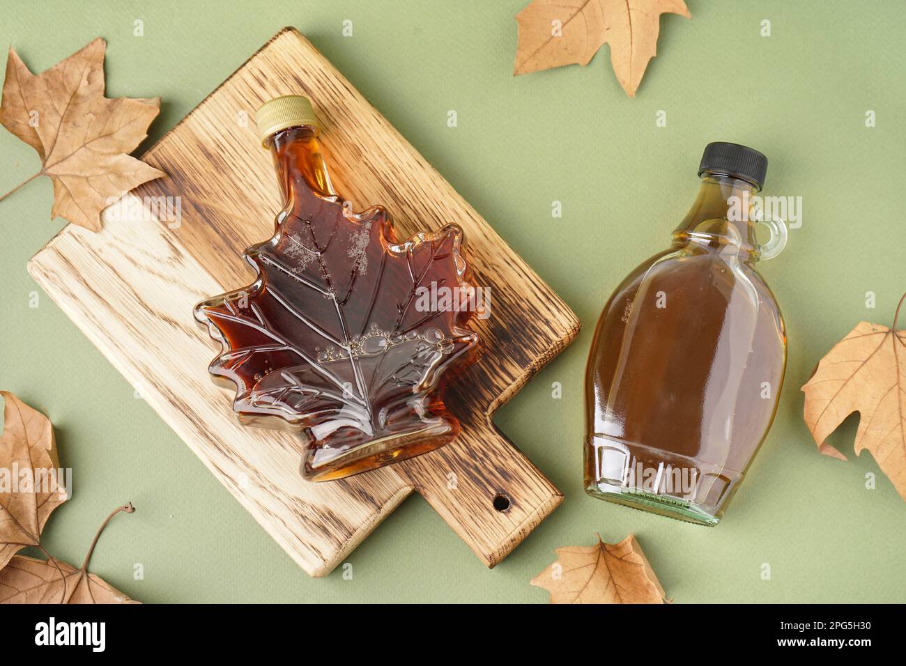 Maple syrup bottles on glass hi-res stock photography and images - Alamy