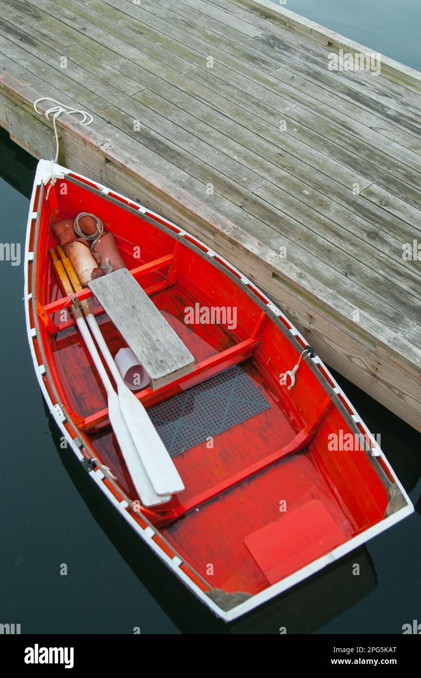 Rowboat dinghy tied to dock in Maine Stock Photo - Alamy
