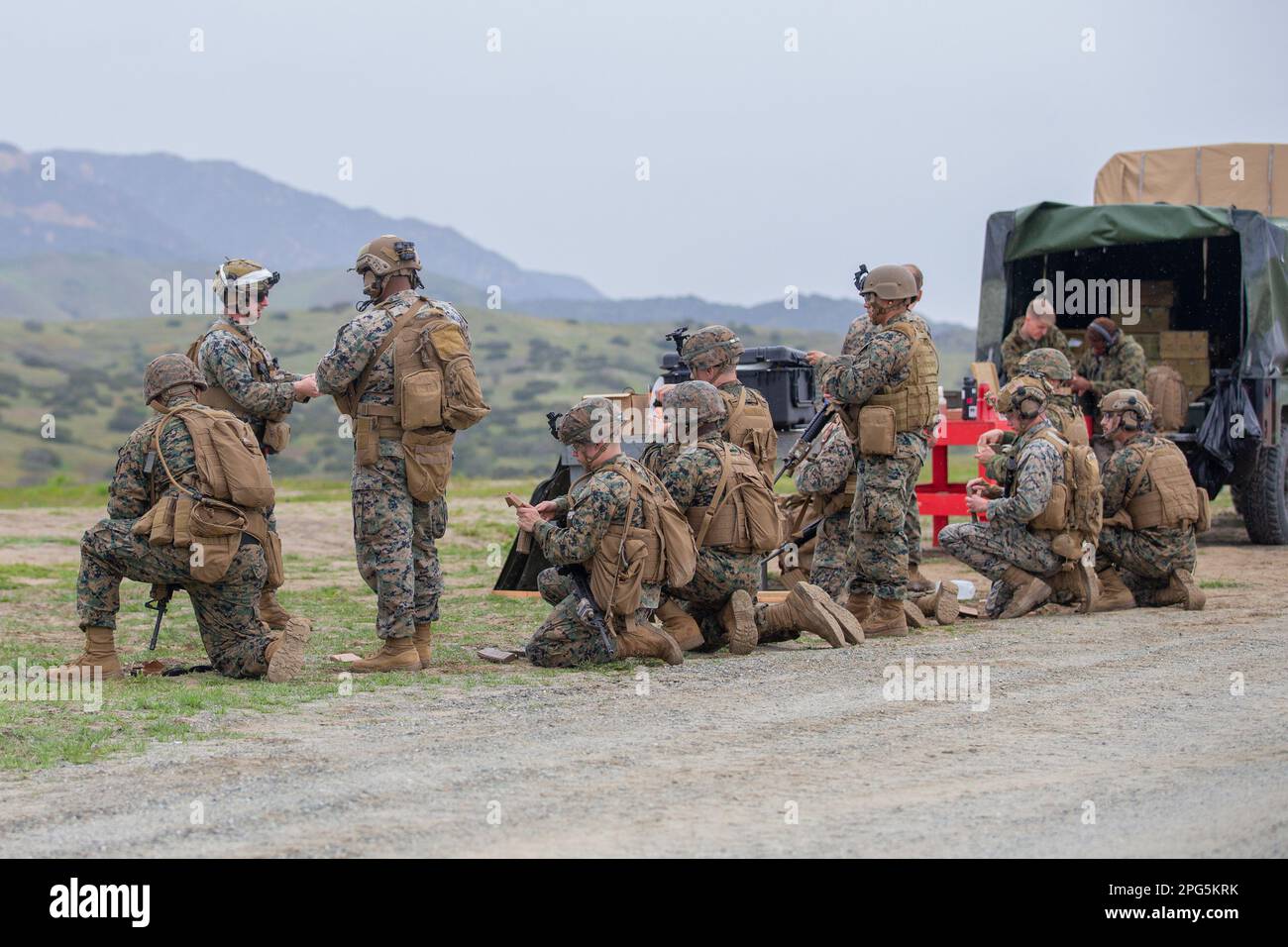 U.S. Marines in the ANGLICO Basic Course receive ammunition in ...