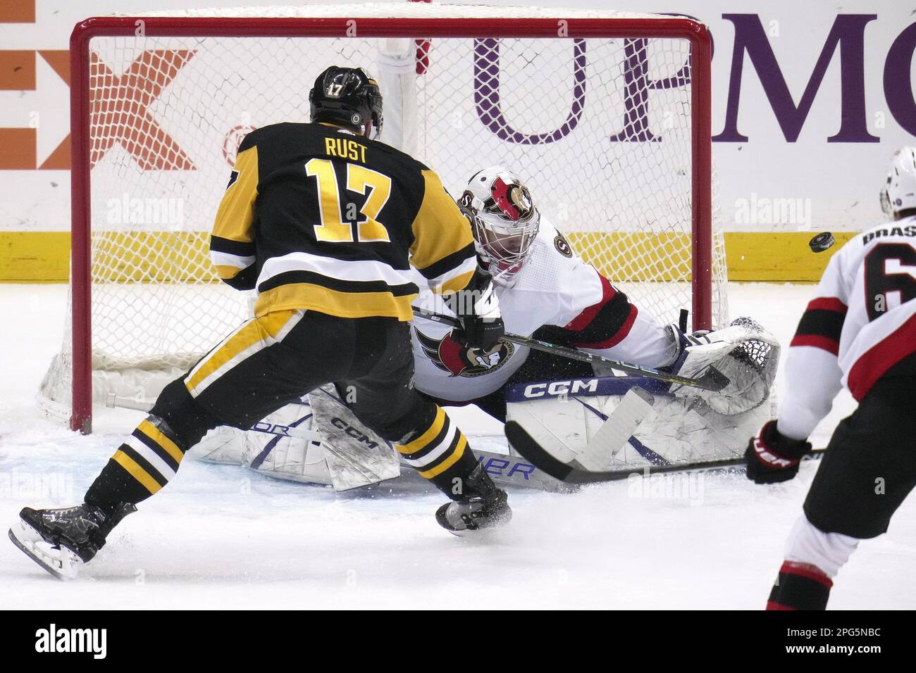 Pittsburgh Penguins' Bryan Rust (17) can't get a shot past Ottawa ...
