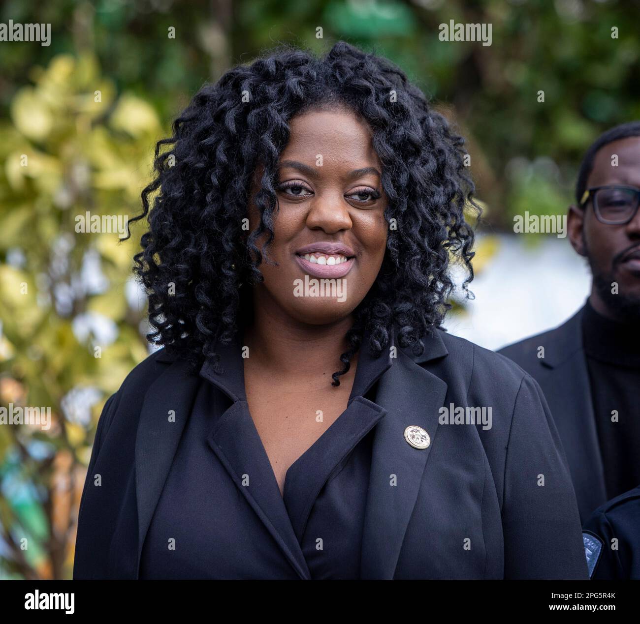North Miami Beach Commissioner Daniela Jean smiles during an unveiling ...