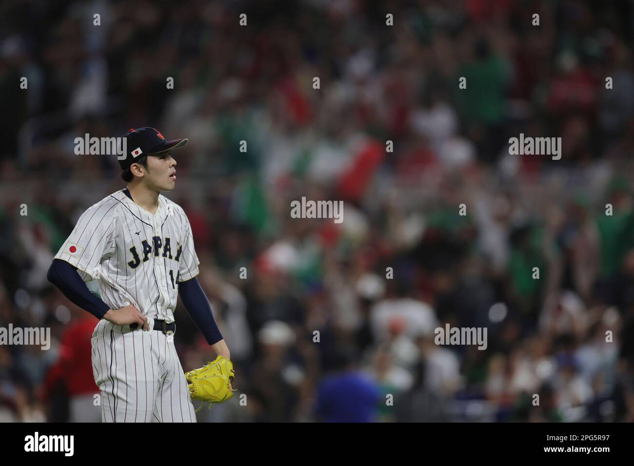 Roki Sasaki of Japan is hit three-run homer by Luis Urias of Mexico in ...