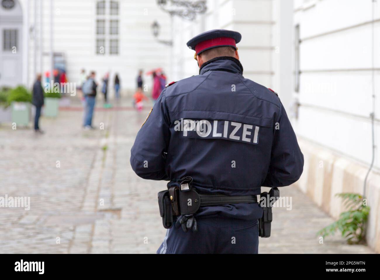 Policeman patrolling hi-res stock photography and images - Alamy
