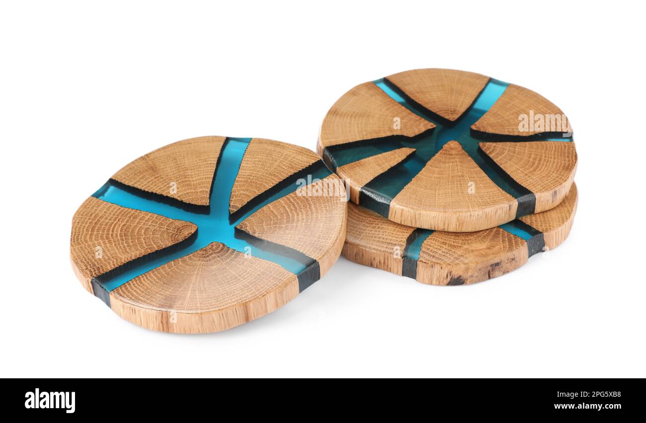 Stylish wooden cup coasters on white background Stock Photo - Alamy
