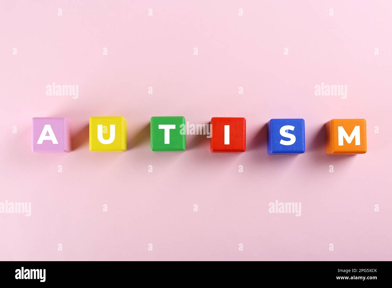 Word Autism made with colorful cubes on white background, top view ...