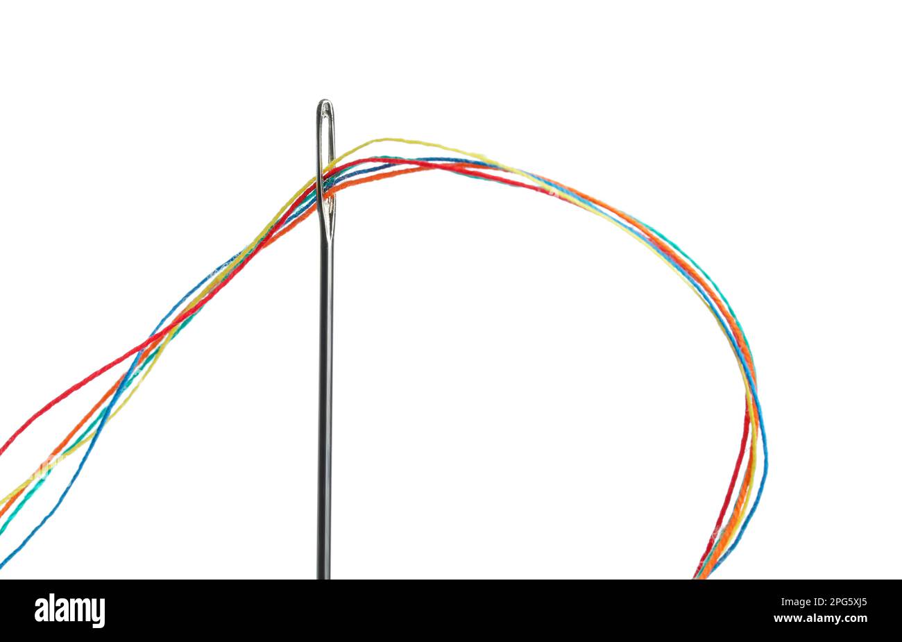 Sewing needle with colorful threads isolated on white Stock Photo - Alamy