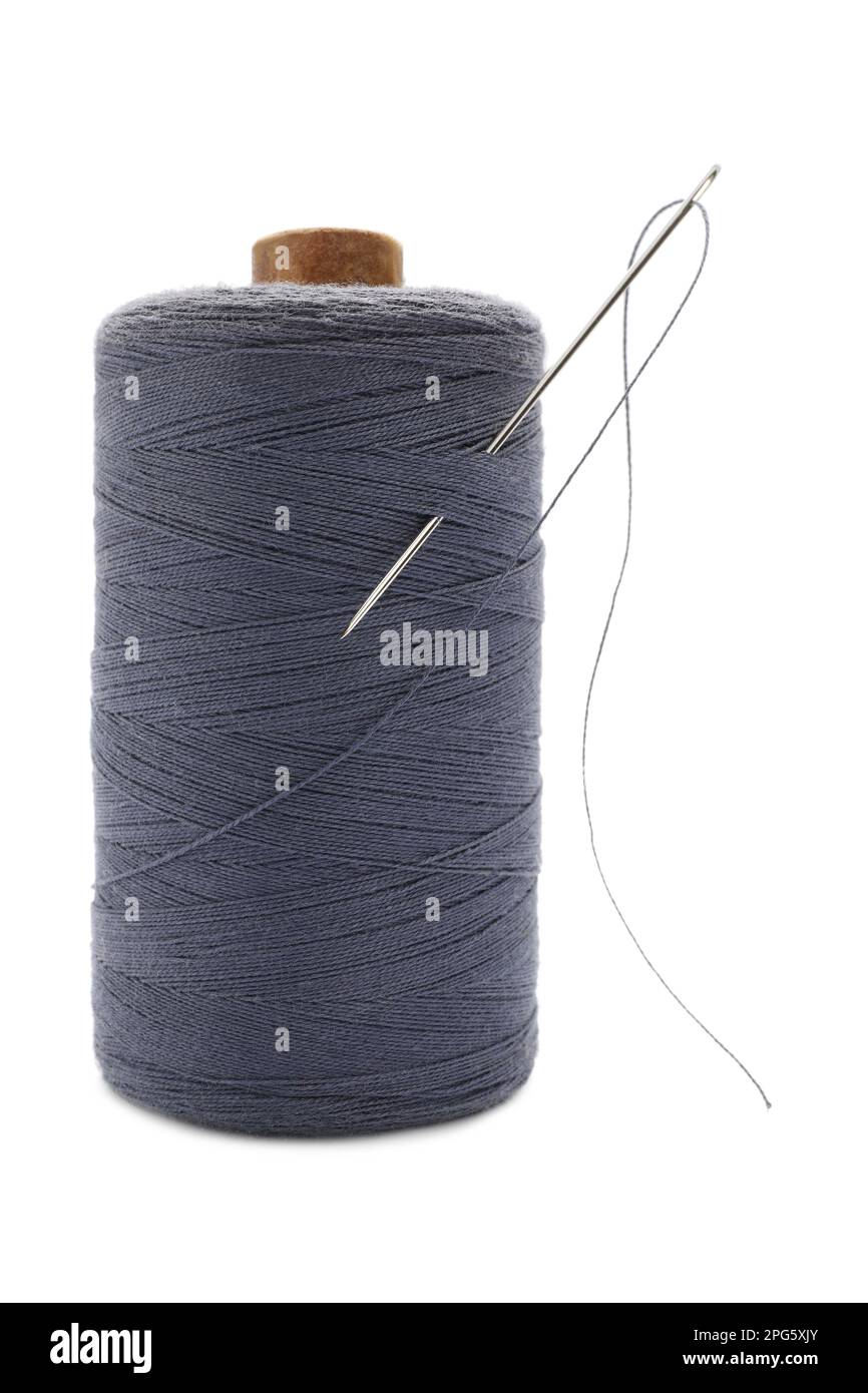 Grey sewing thread with needle on white background Stock Photo - Alamy