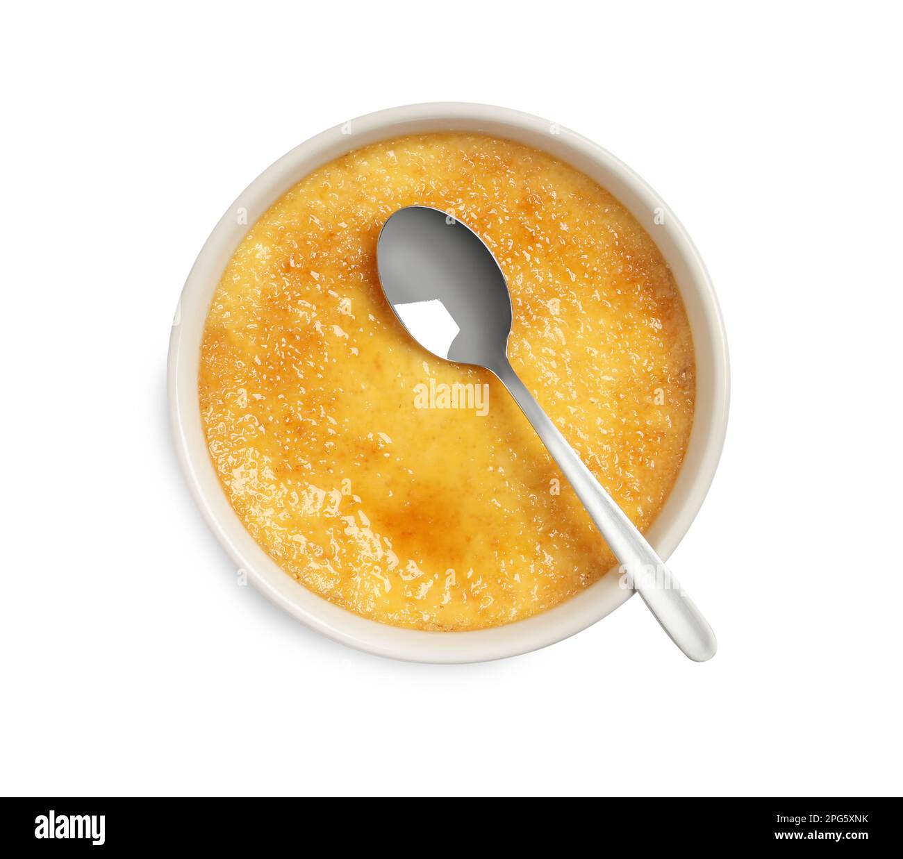 Delicious creme brulee and spoon in ceramic ramekin isolated on white ...