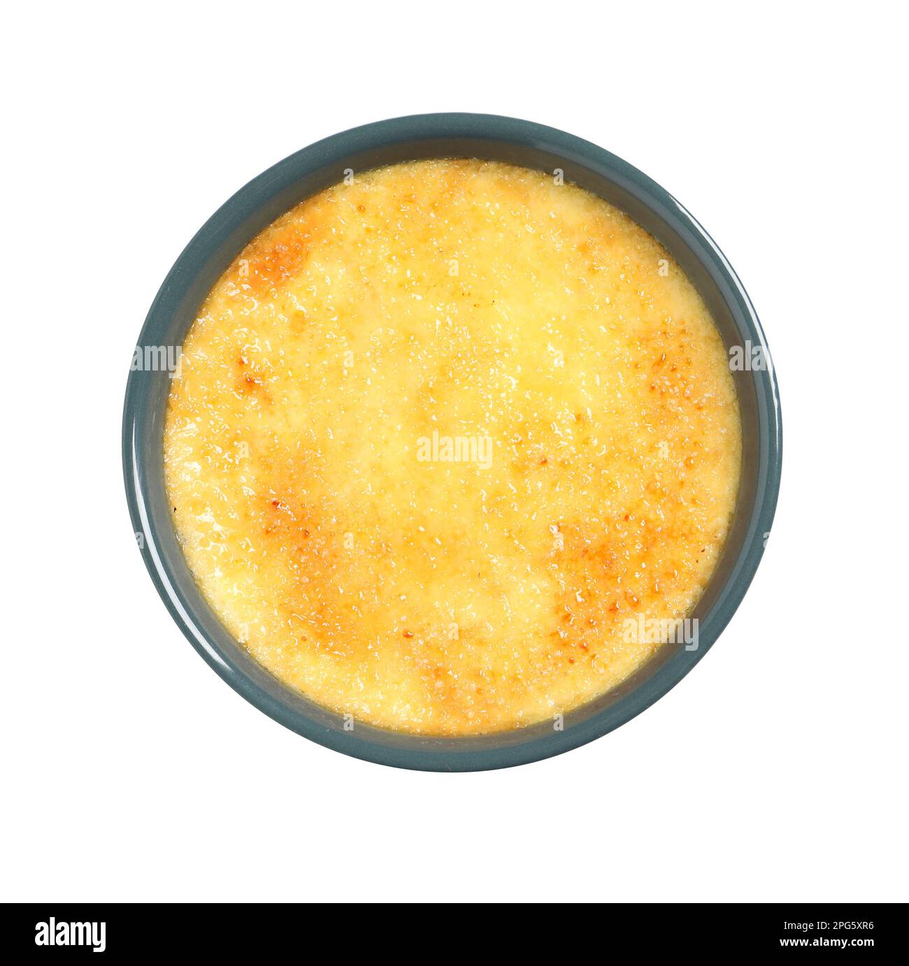 Delicious creme brulee in ceramic ramekin isolated on white, top view ...