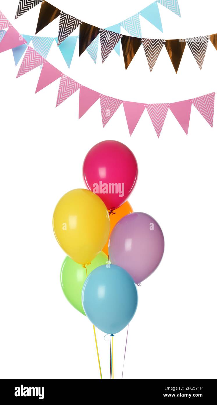 Colorful balloons and decorative bunting flags on white background ...