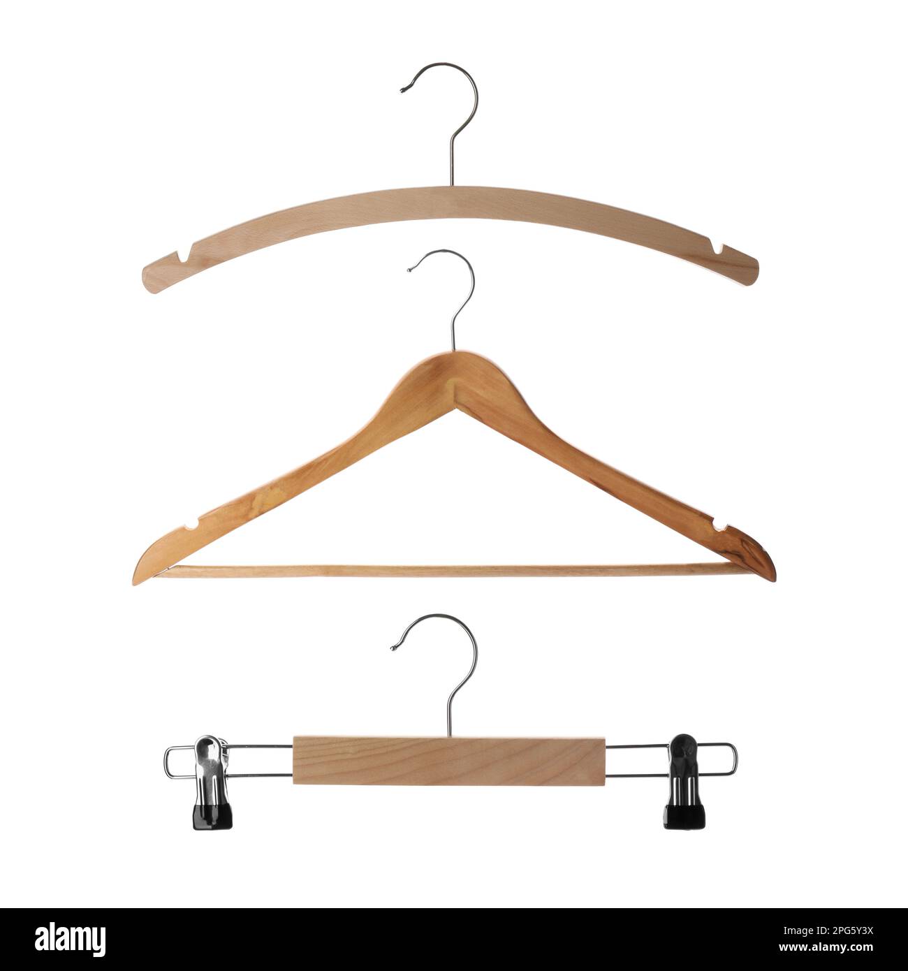 Set with different empty hangers on white background Stock Photo - Alamy