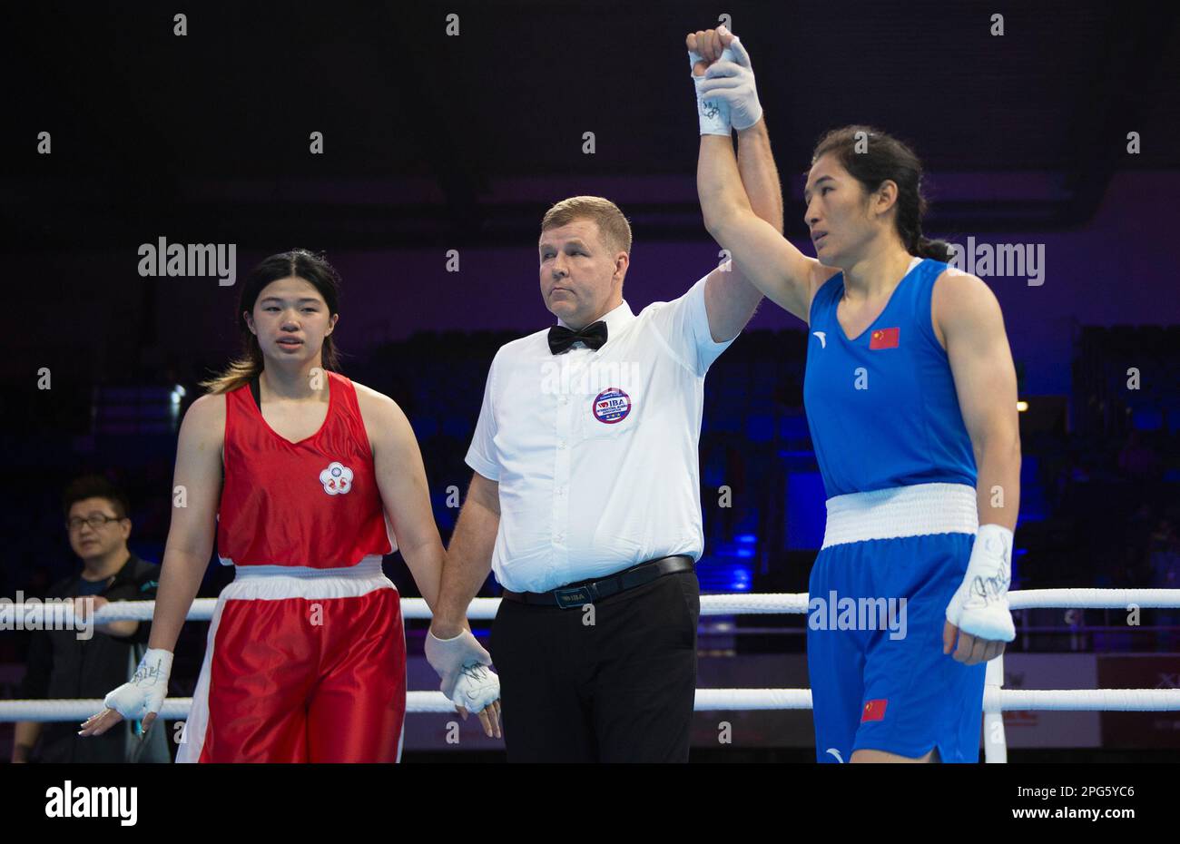New Delhi, India. 20th Mar, 2023. Li Qian (R) is declared the winner of ...