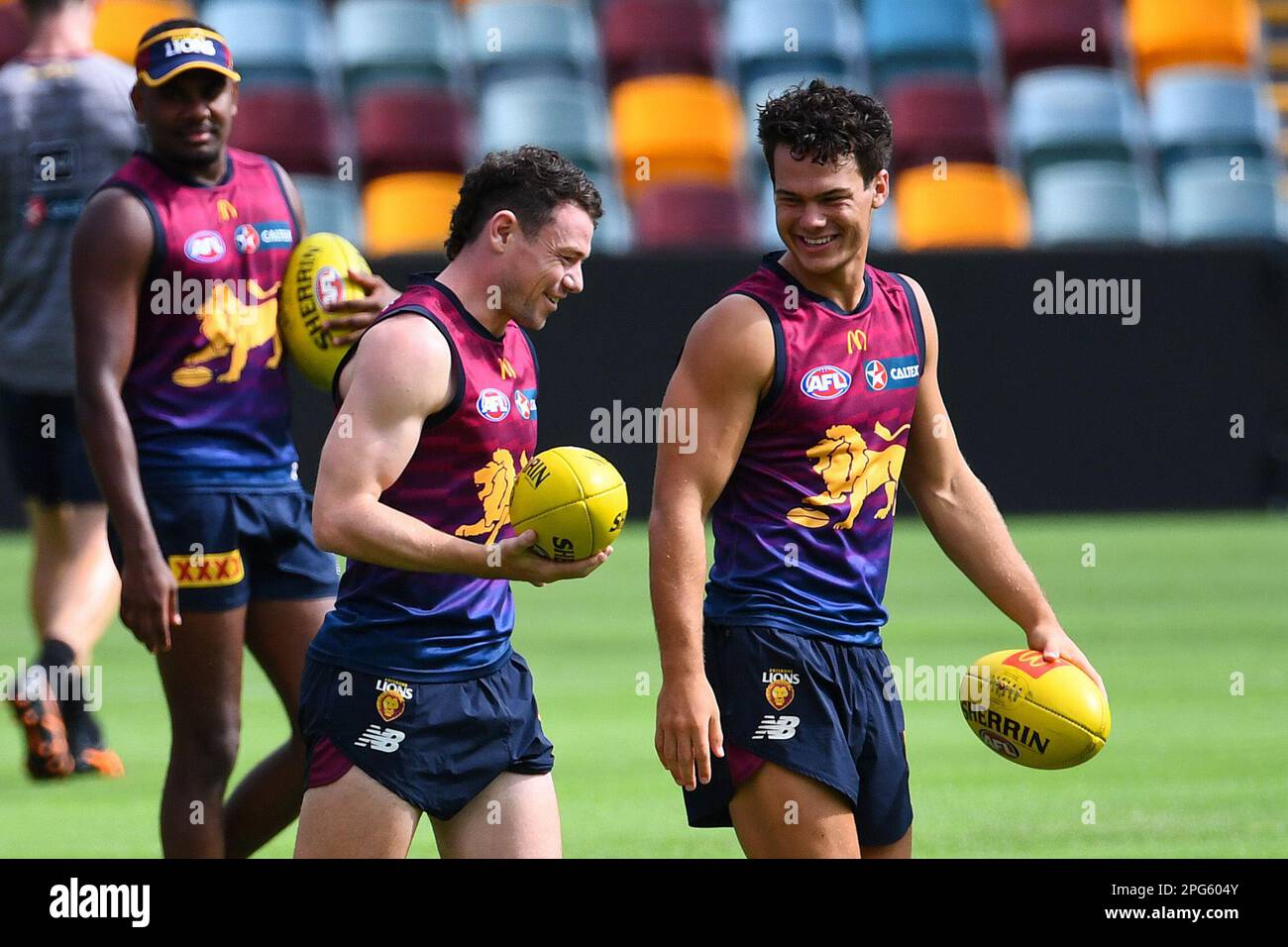 Lachie Neale and Cam Rayner of the Lions have a laugh during a Brisbane ...