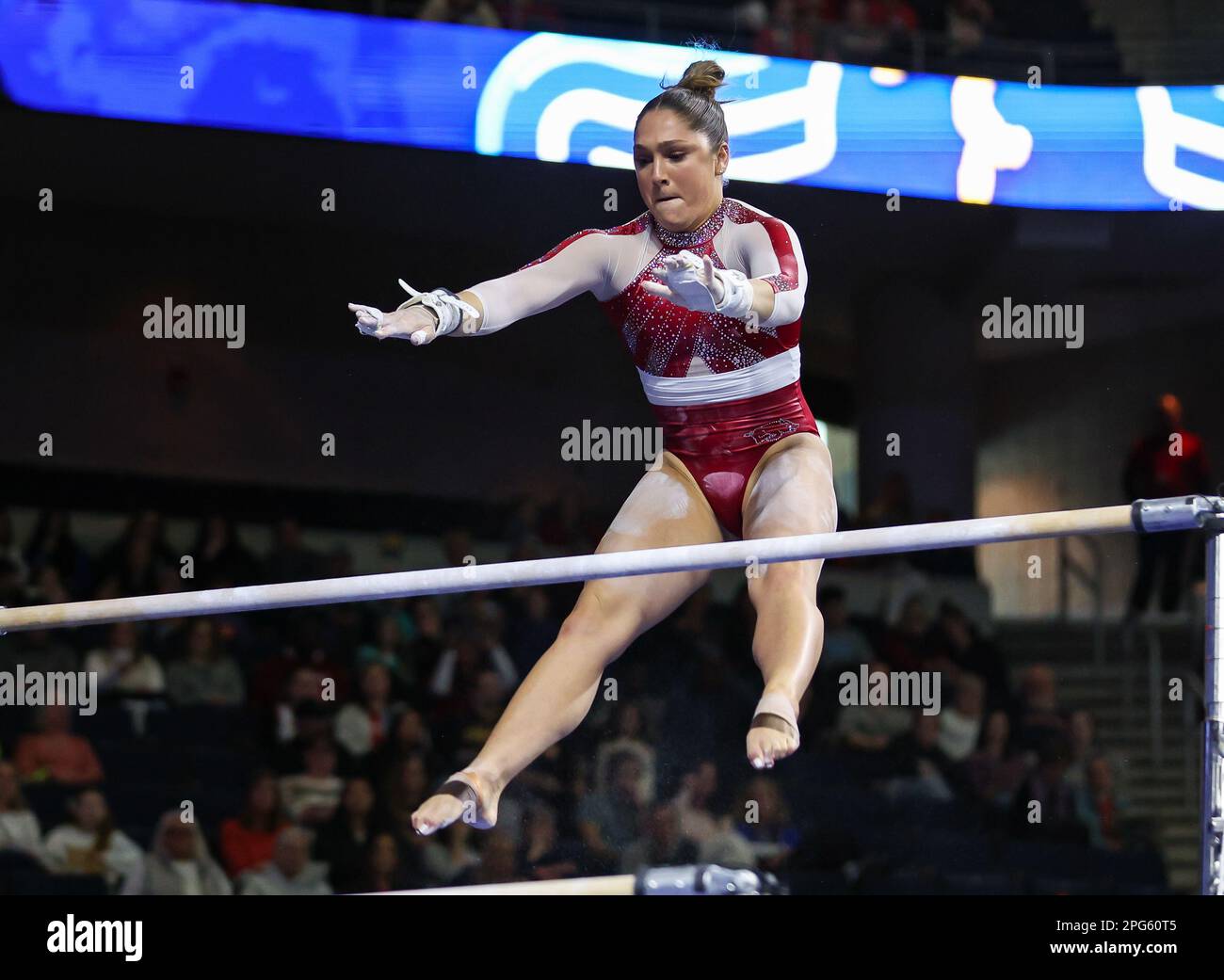 March 18, 2023: Arkansas' Jensen Scalzo competes on the uneven parallel ...