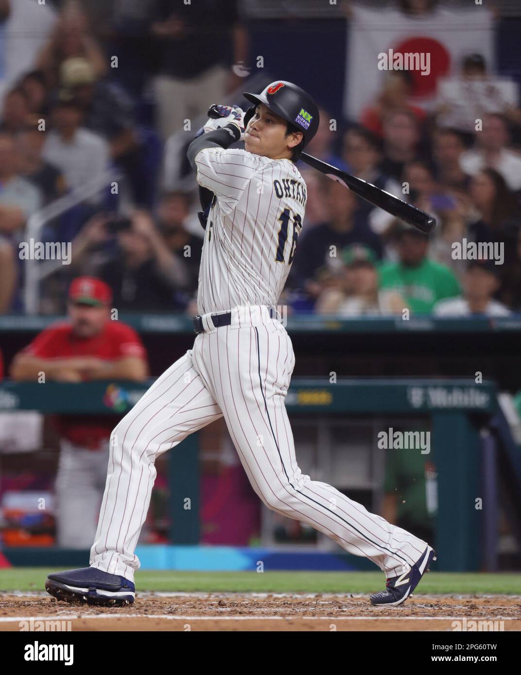 Shohei Ohtani makes a base hit in the 6th inning during the World ...
