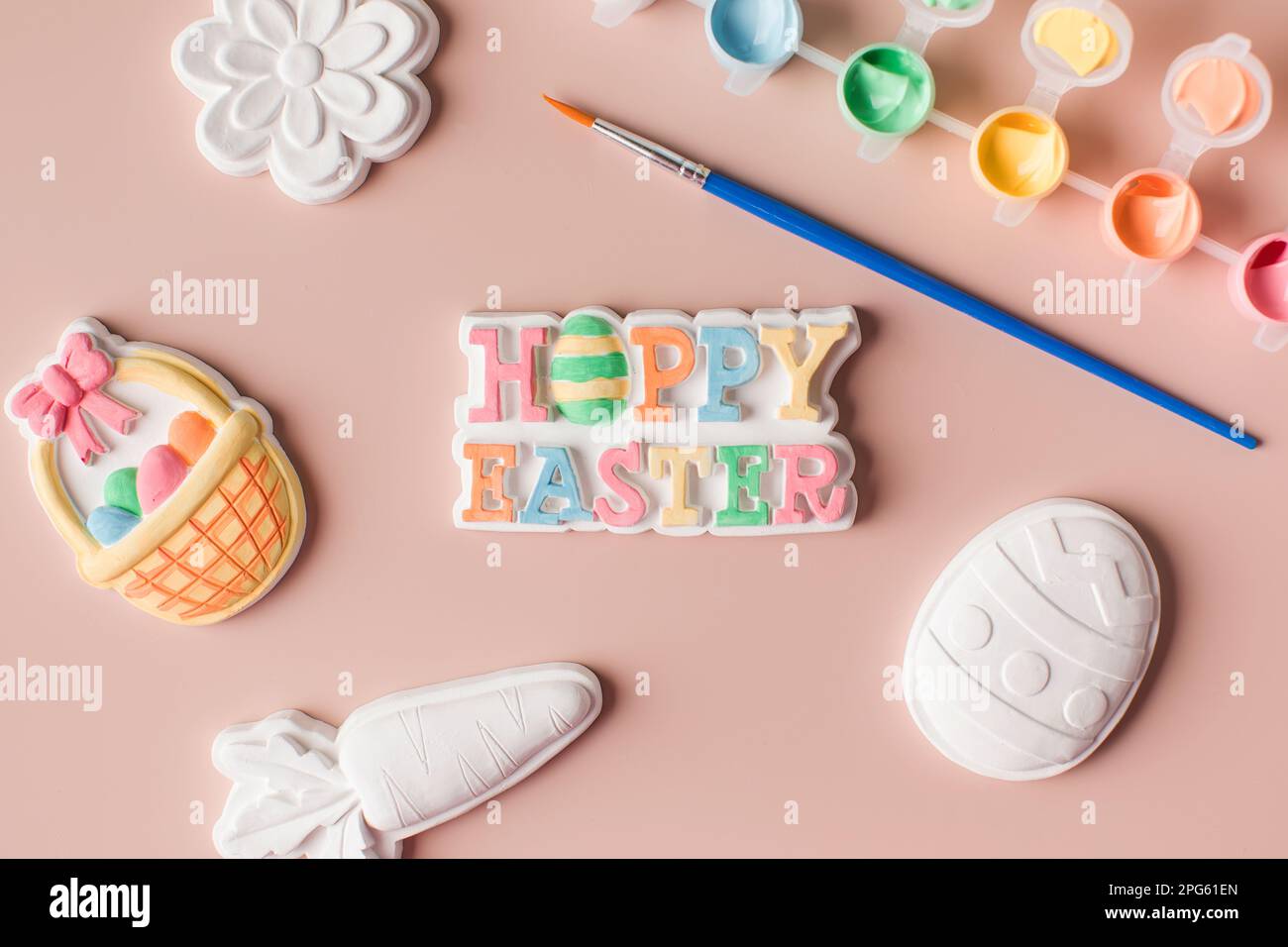 Easter figures made of plaster with paints, the concept of children's ...