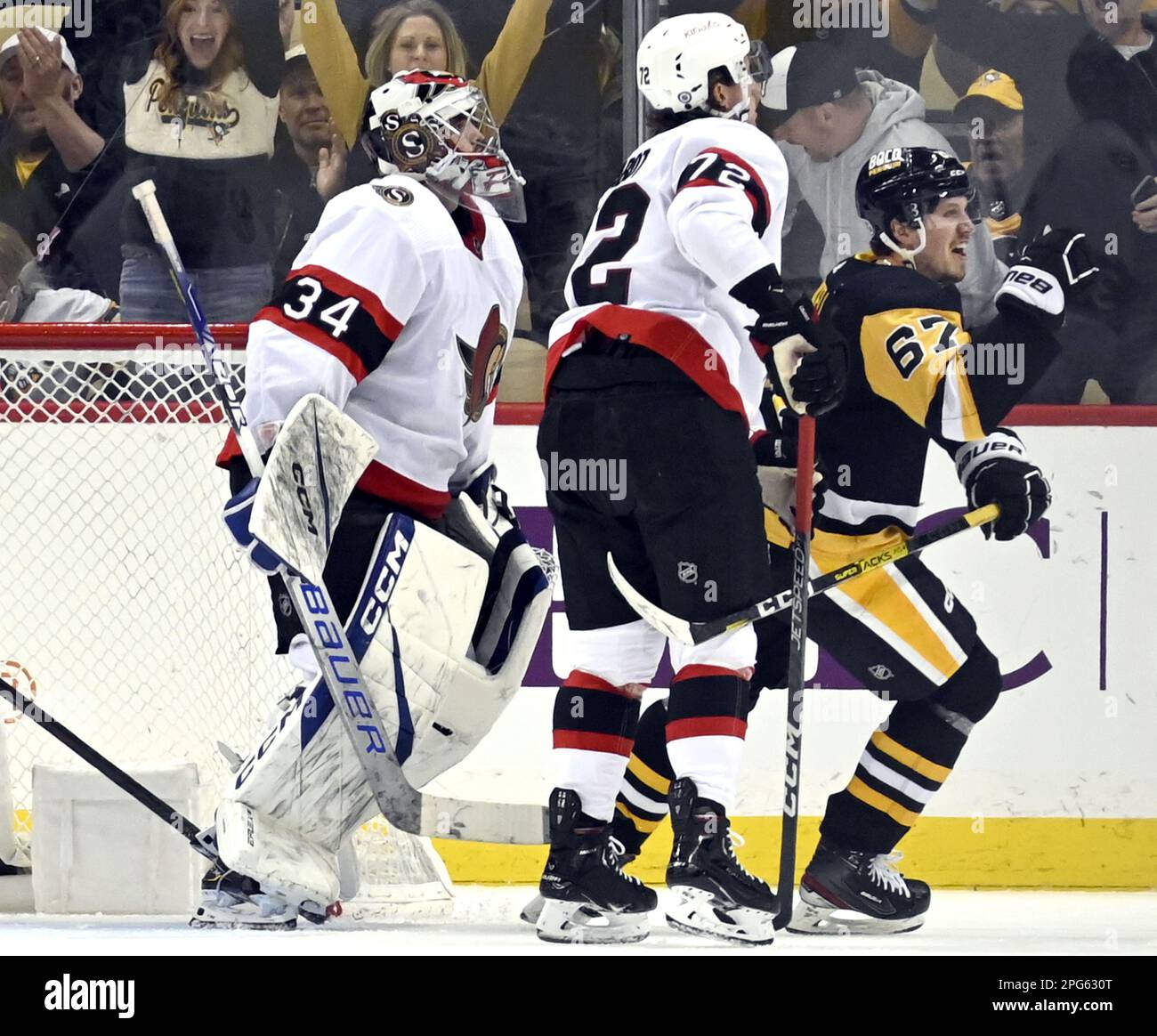 Pittsburgh Penguins right wing Rickard Rakell (67) skates pass Ottawa ...