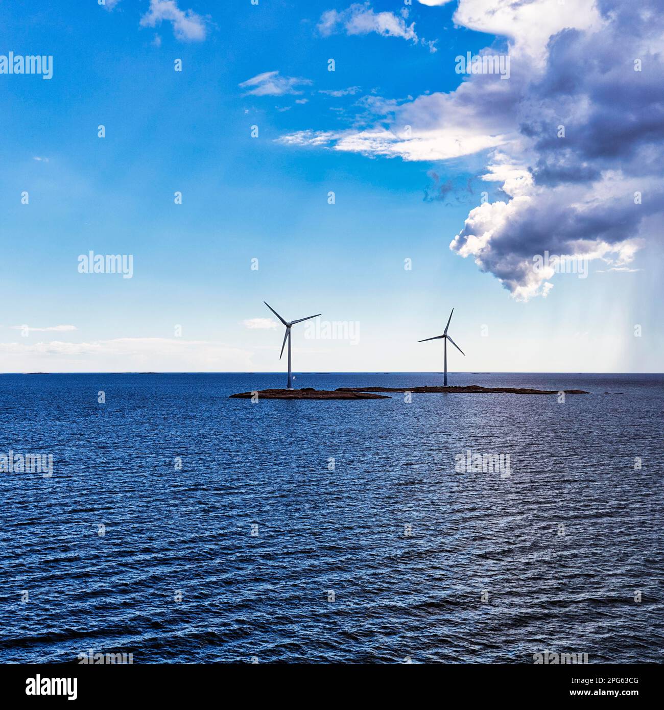 Two wind turbines on small islands, wind turbine, wind farm in the ...