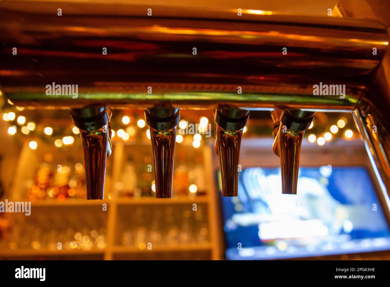 Beer or wine taps at a restaurants bar Stock Photo - Alamy
