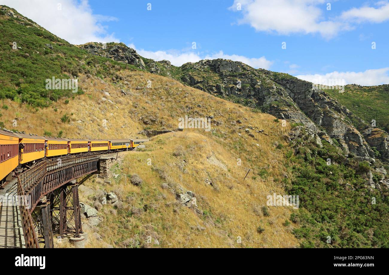 Train entering a tunnel - Taieri gorge - New Zealand Stock Photo - Alamy