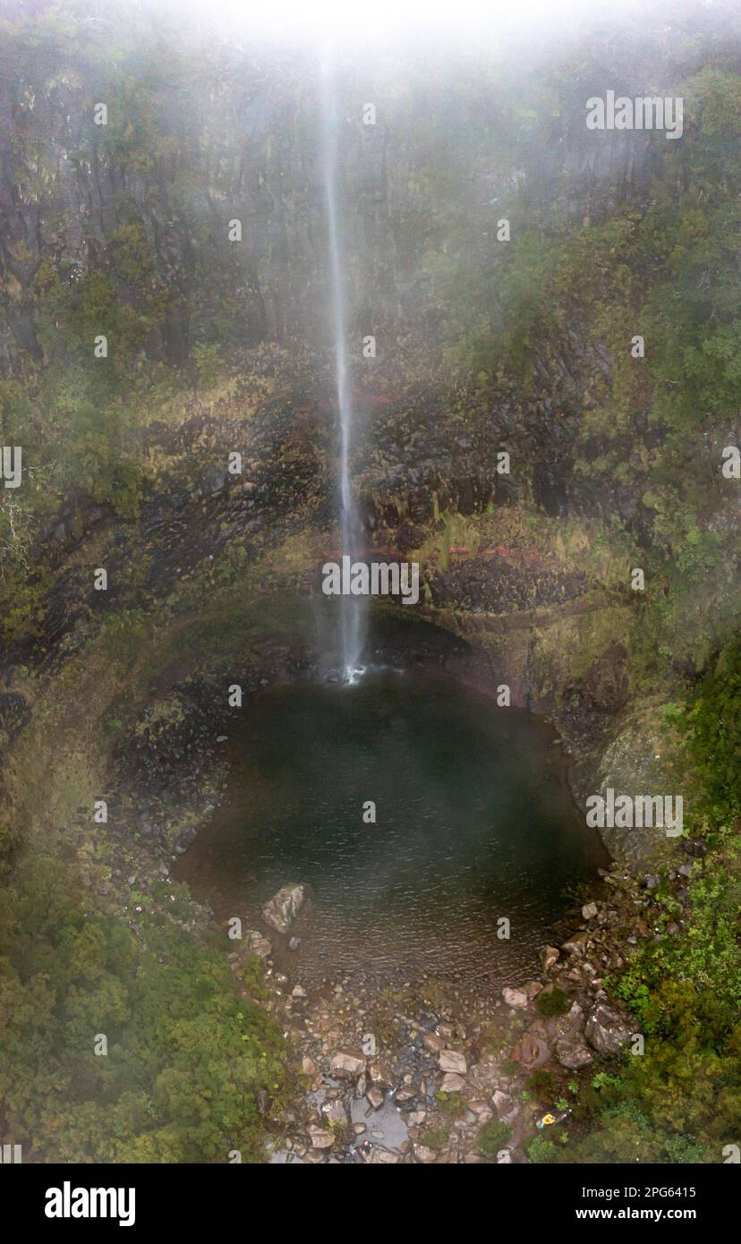Aerial view, Lagoa do Vento with Upper Risco waterfall, forest and fog ...
