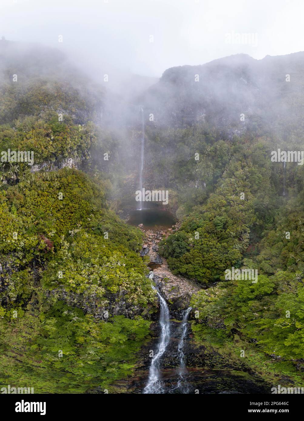 Aerial view, Lagoa do Vento with Upper Risco waterfall, forest and fog ...