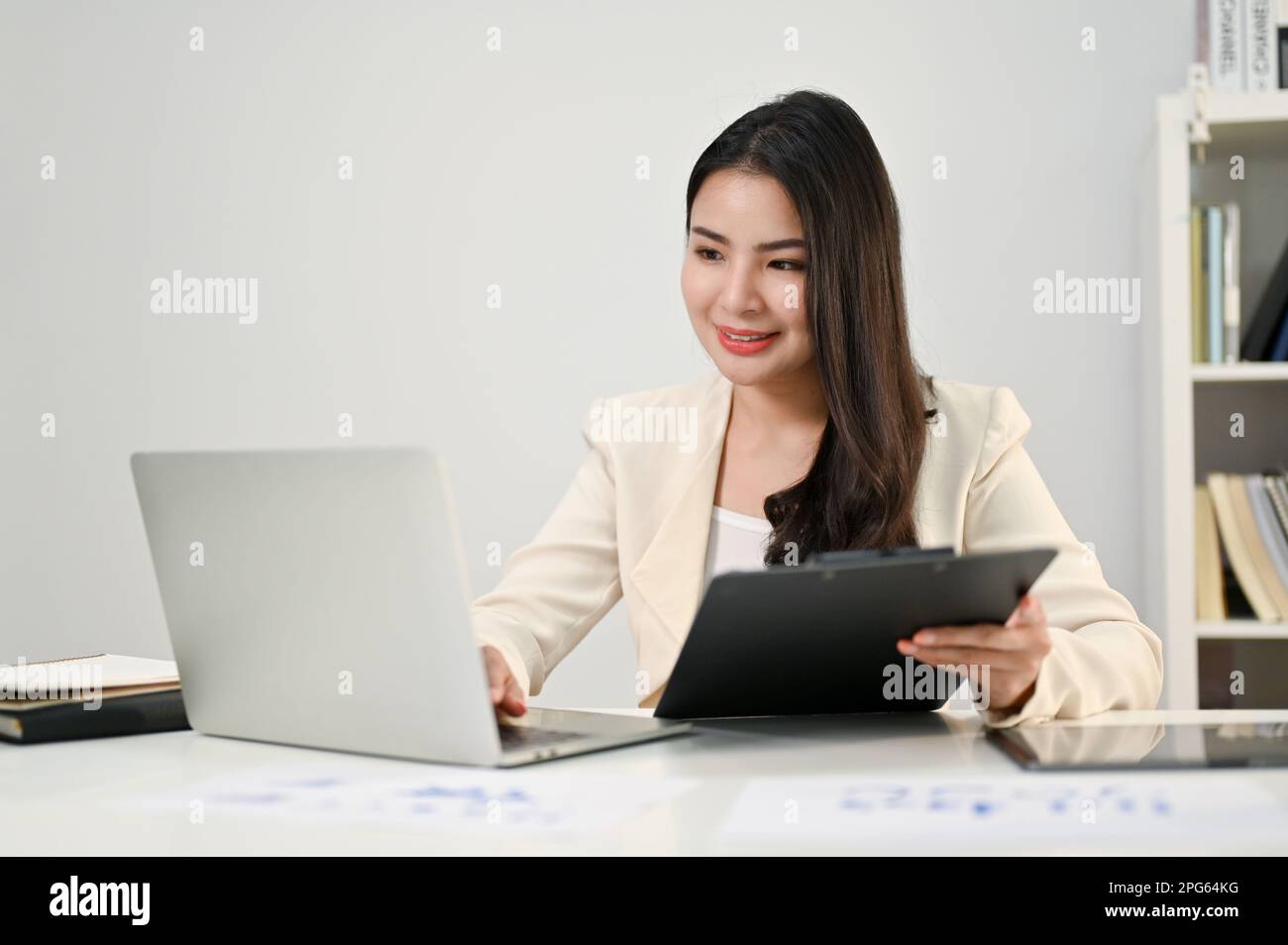 Professional and beautiful millennial Asian businesswoman or female ...