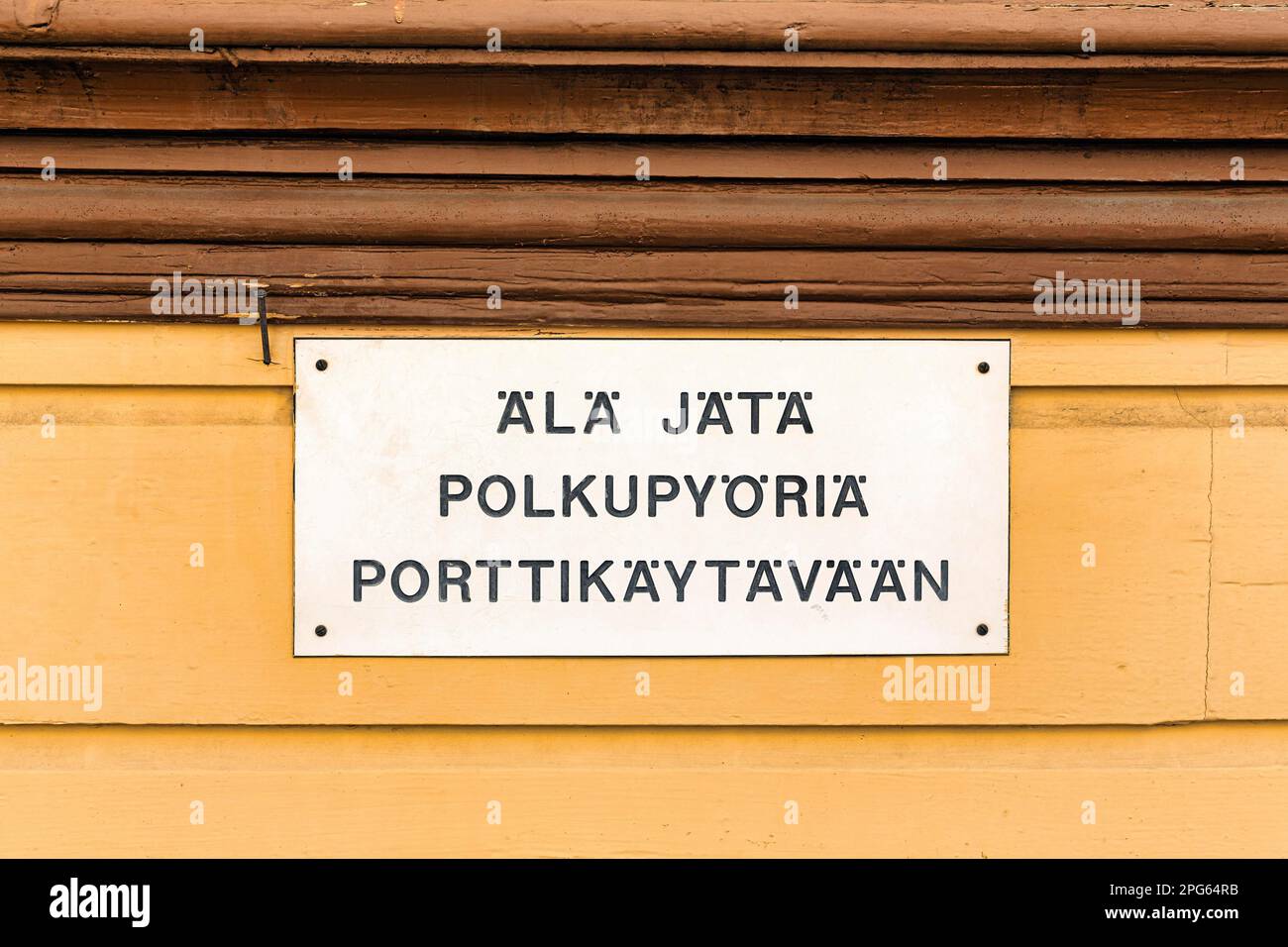 Polite sign on wooden facade, old wooden house, inscription, please do ...