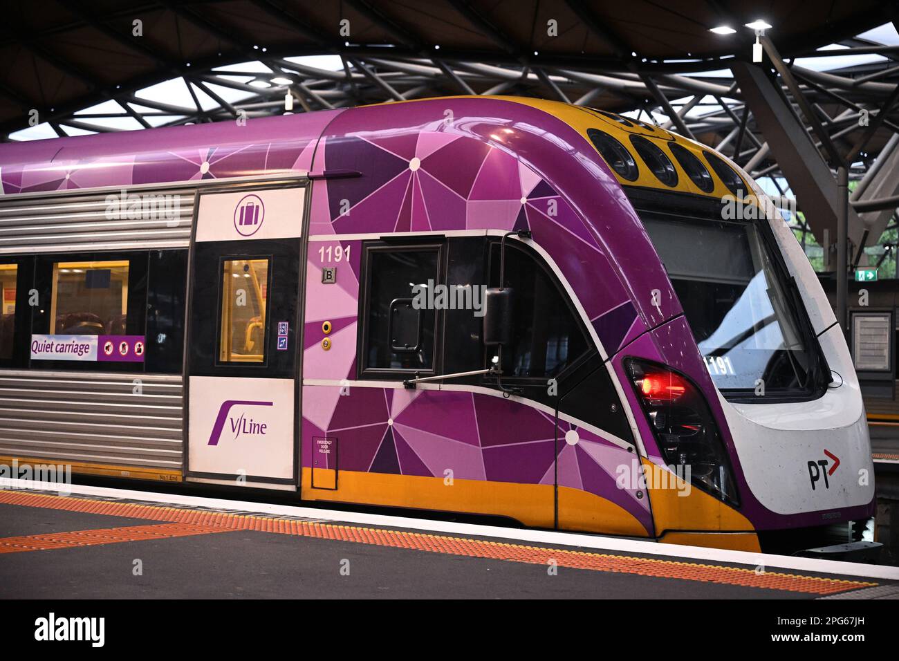 A V/Line train is seen on a platform at Southern Cross Station in ...