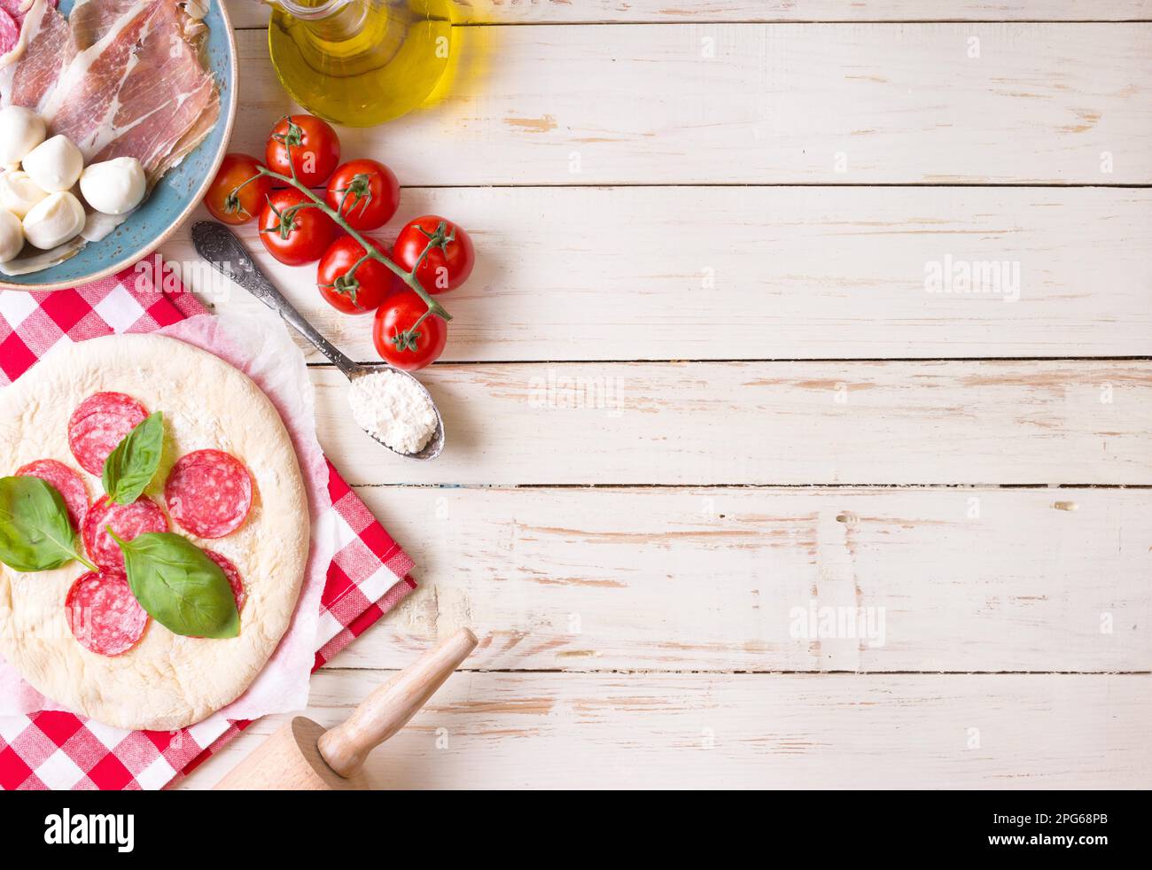 Pizza making background. Ingredients for making pizza. Space for text ...