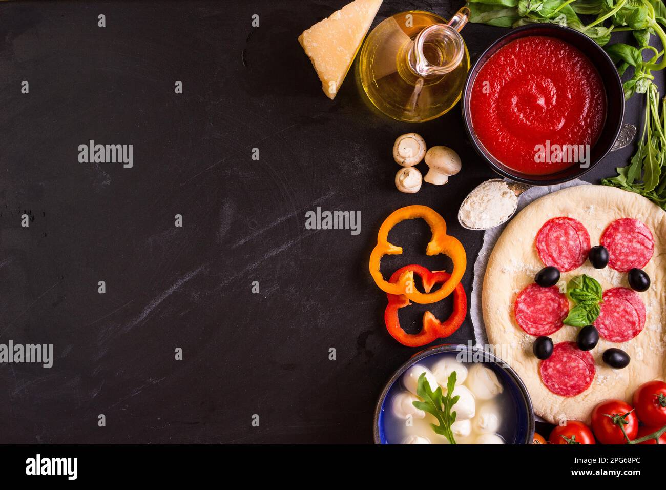 Pizza making background. Ingredients for making pizza. Space for text ...