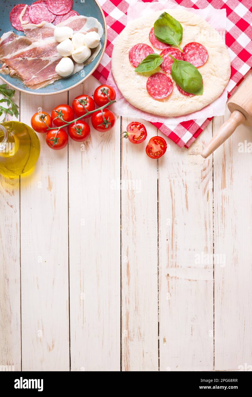 Pizza making background. Ingredients for making pizza. Space for text ...