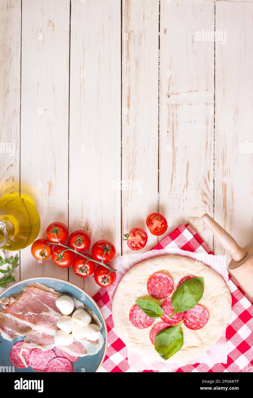 Pizza making background. Ingredients for making pizza. Space for text ...
