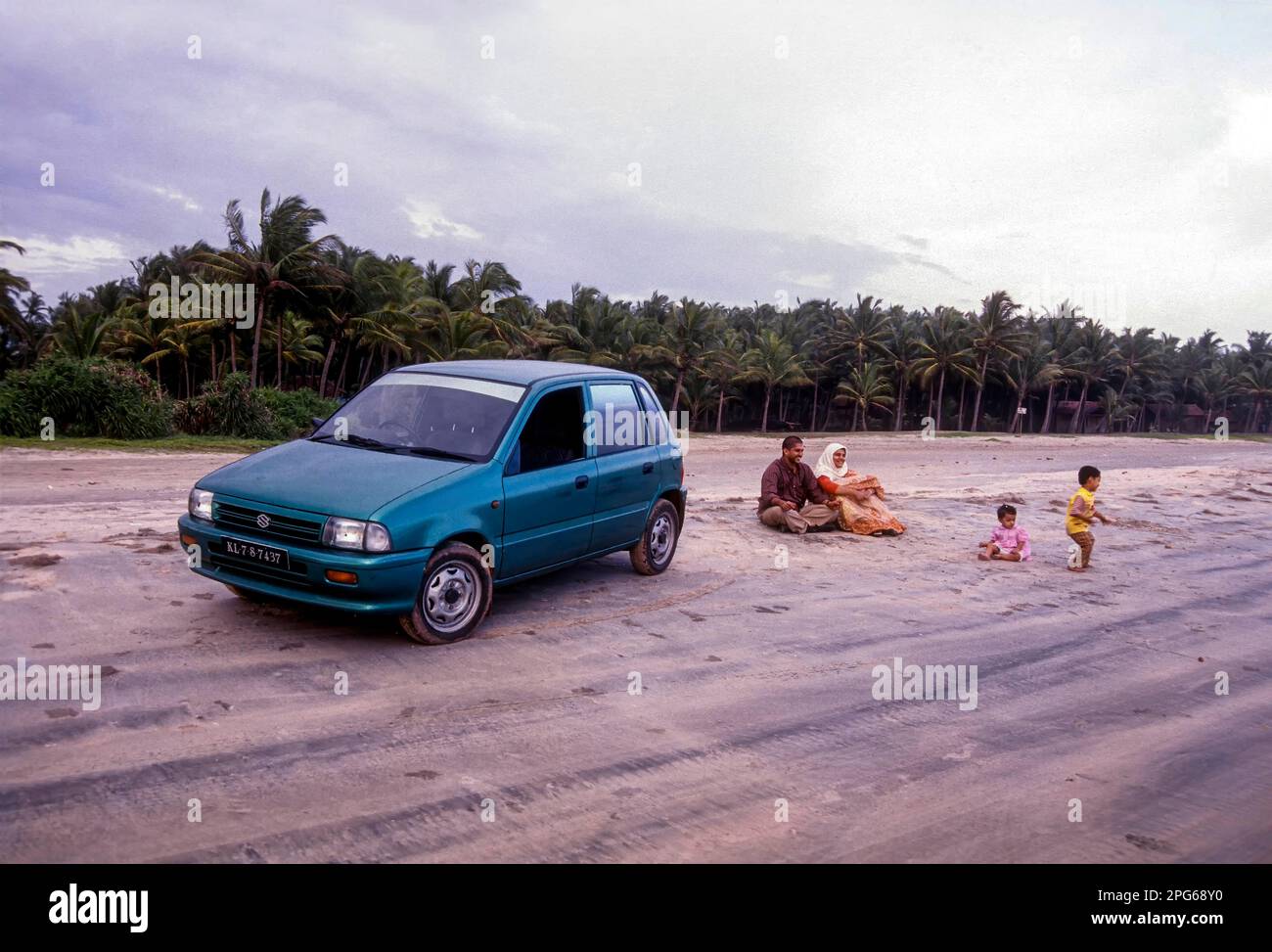 A Muslim family enjoying at Muzhappilangad drive in beach near Kannur ...