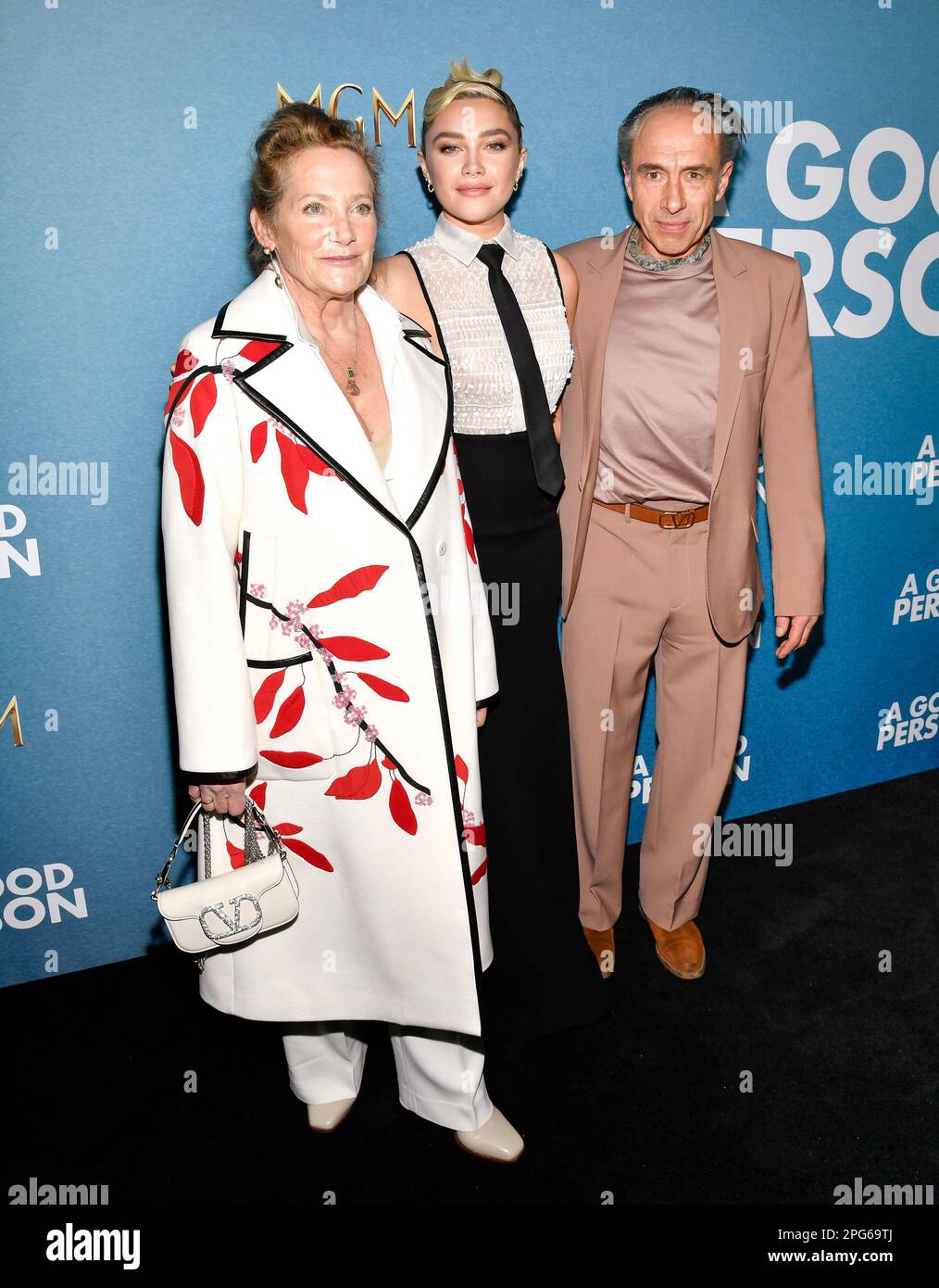 Florence Pugh, center, and her parents Deborah Mackin, left, and ...