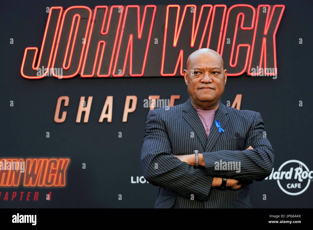 Laurence Fishburne, a cast member in "John Wick: Chapter 4," poses at ...