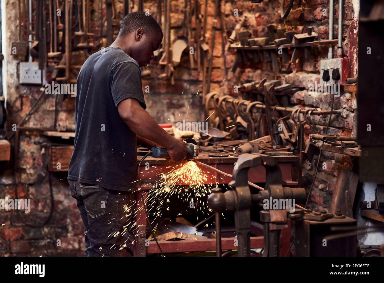 Man using blowtorch in manufacturing hi-res stock photography and ...
