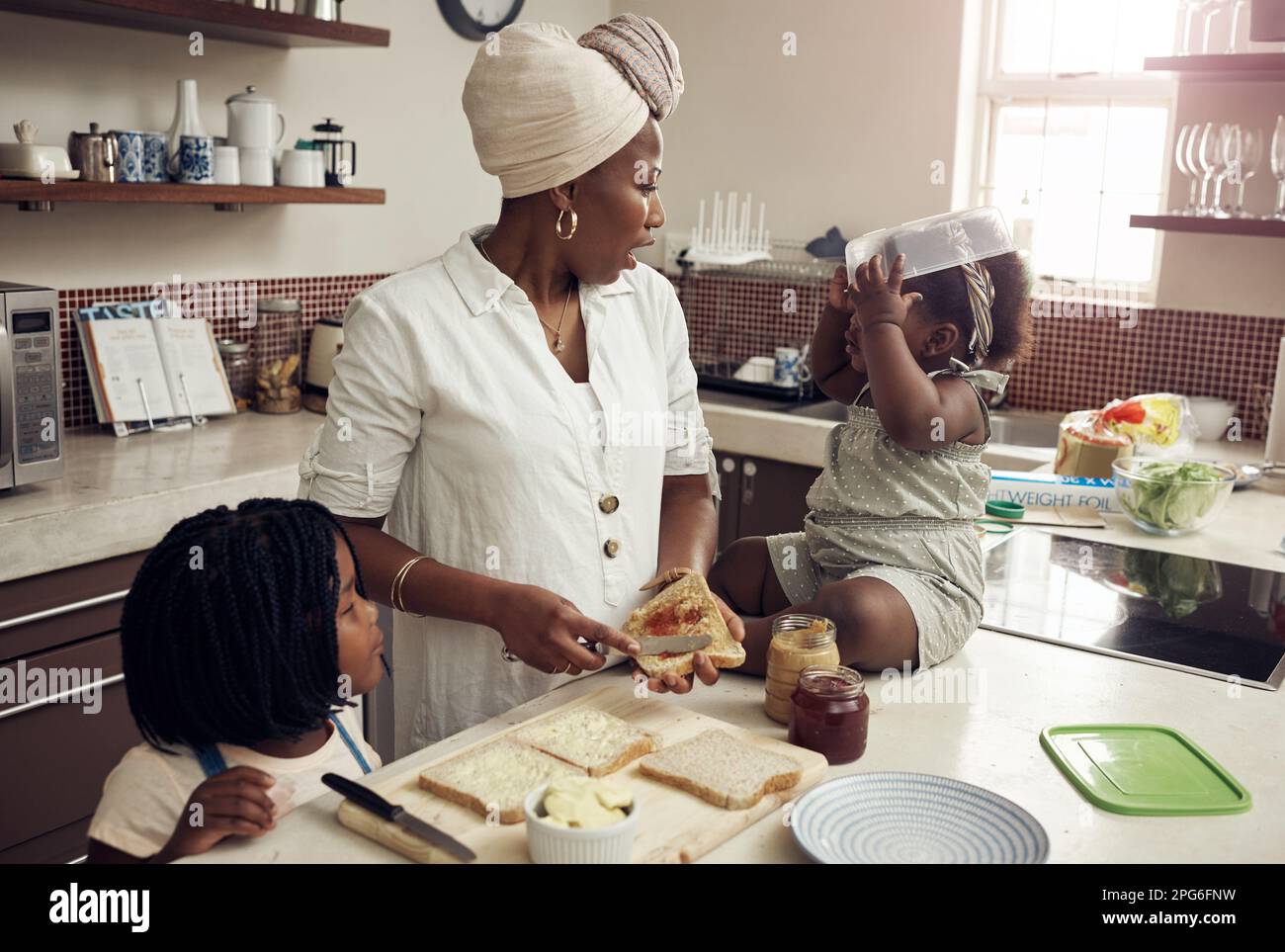 Theres never a dull moment when shes around. a young mother preparing a ...