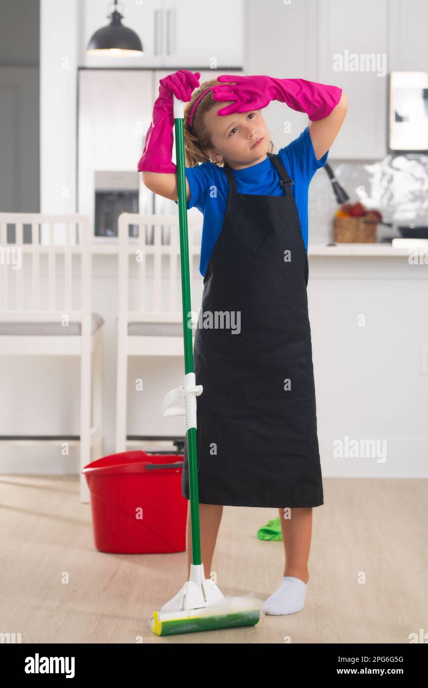 Boy mopping sweeping floor hi-res stock photography and images - Alamy