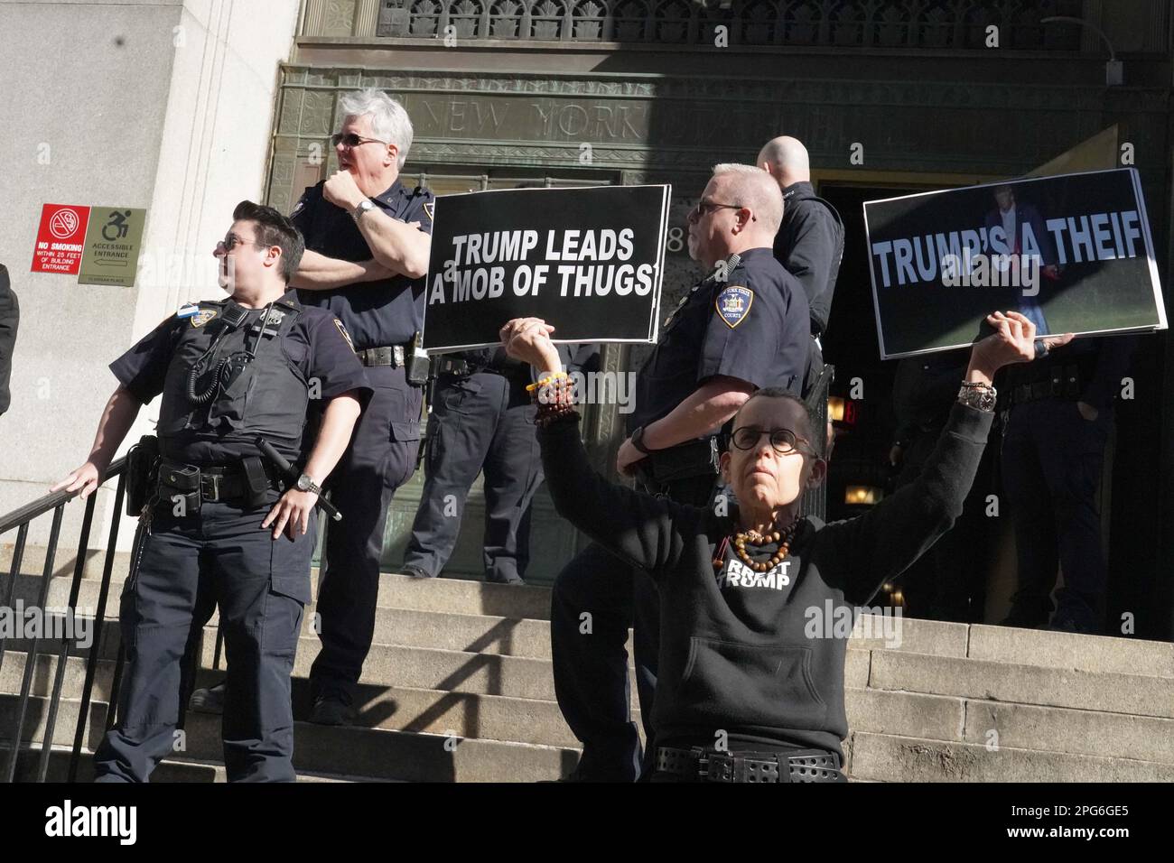 New York, United States. 19th Mar, 2023. Protestors and media gather ...