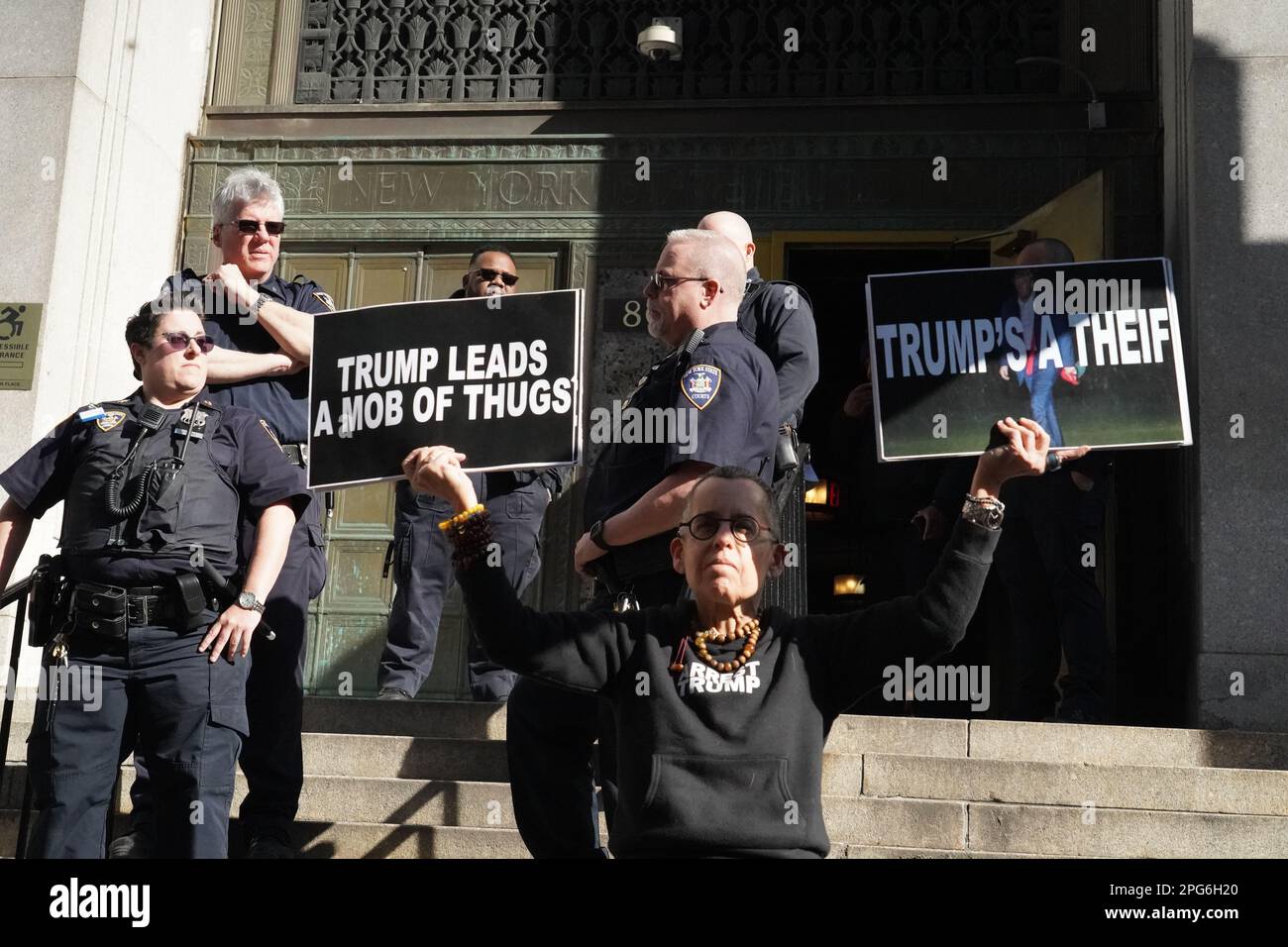 New York, United States. 19th Mar, 2023. Protestors and media gather ...