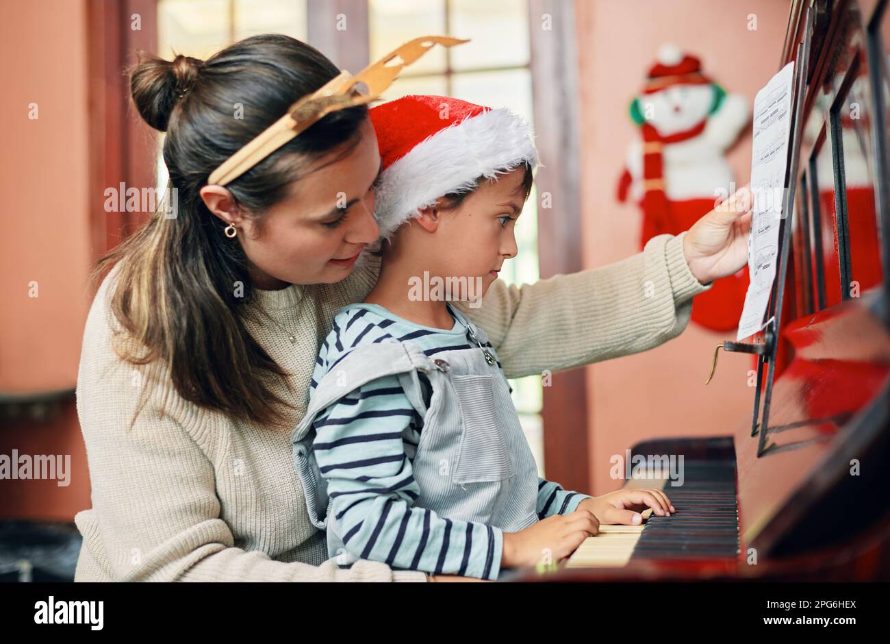 Its beginning to sound a lot like Christmas. an adorable little boy ...