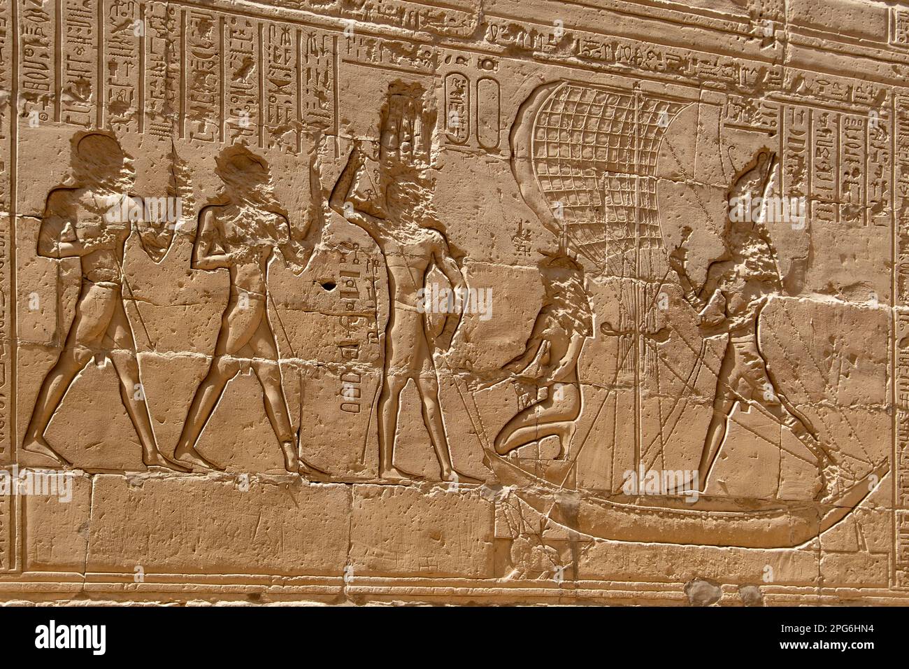 Bas Relief Scene on Outer Wall in Edfu Temple, Edfu, Egypt Stock Photo ...
