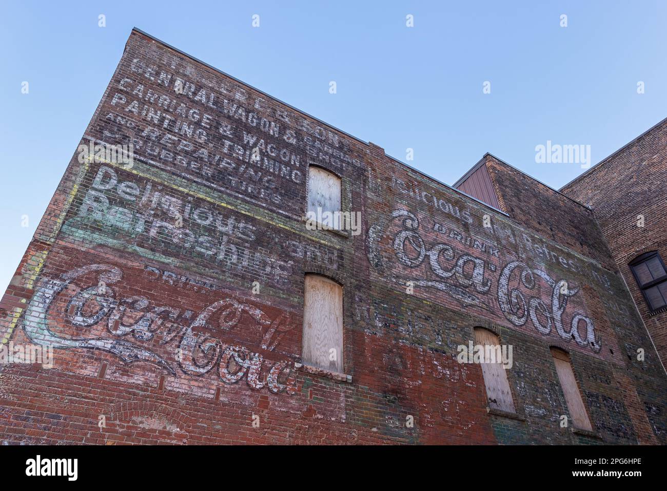 Classic hand painted Coca-Cola ghost sign on a brick wall in Burlington ...