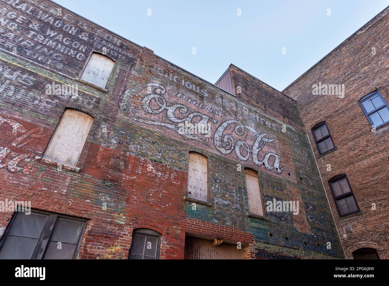 Classic hand painted Coca-Cola ghost sign on a brick wall in Burlington ...
