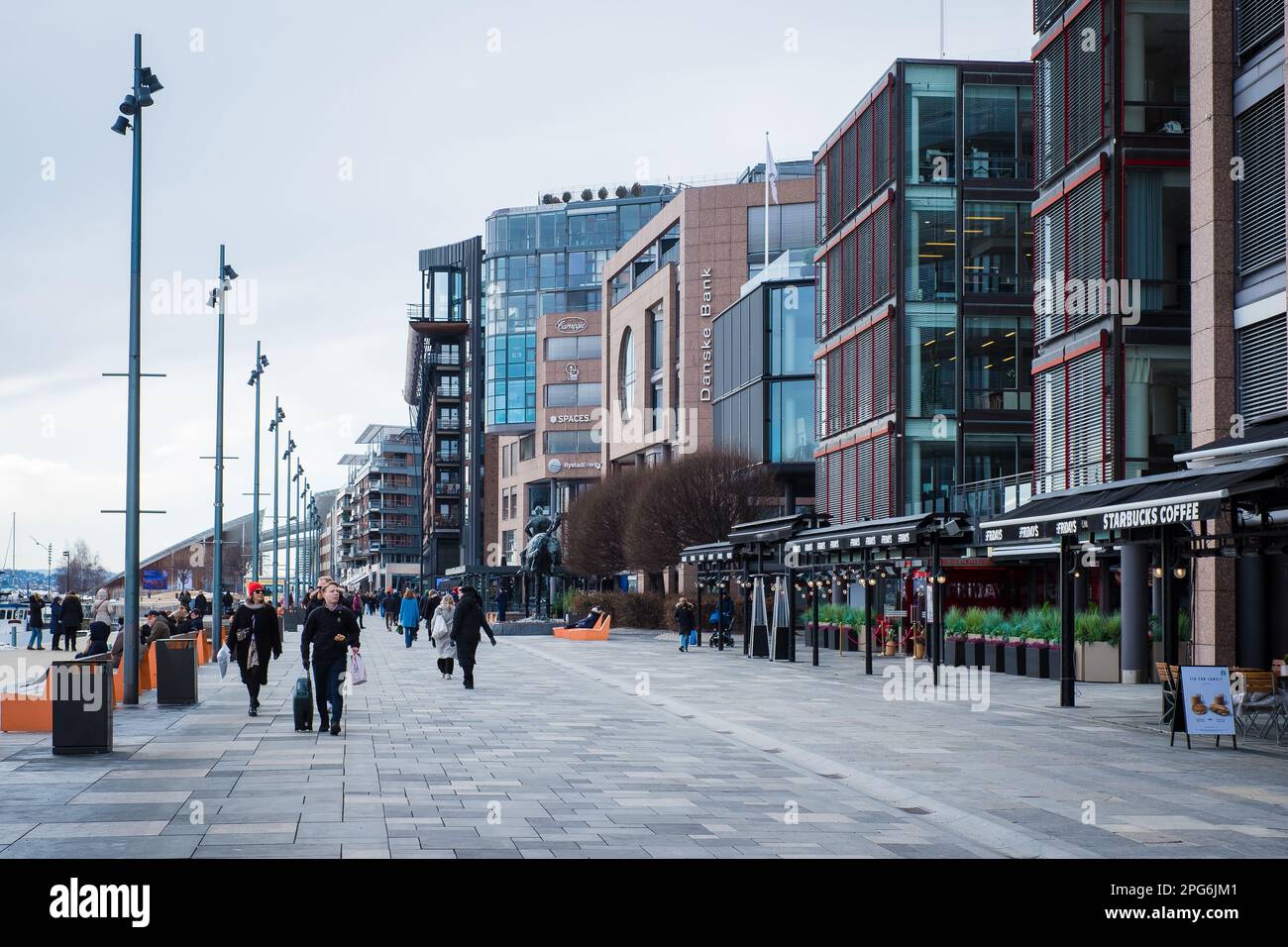 Oslo, Norway - March 11, 2023: Promenade in Aker Brygge district in ...