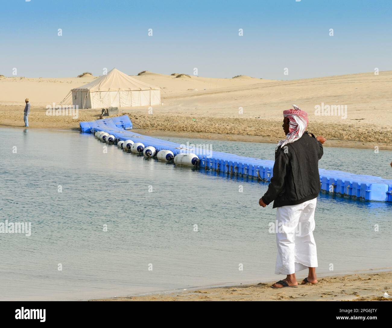 Sand dunes descending into the creek at Al-Adaid Desert in Qatar Stock ...