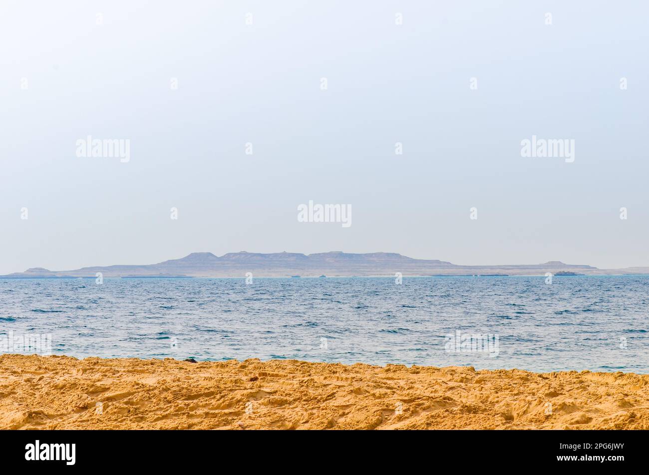 Inland sea at Al-Adaid Desert in Qatar with limestone hills in the ...