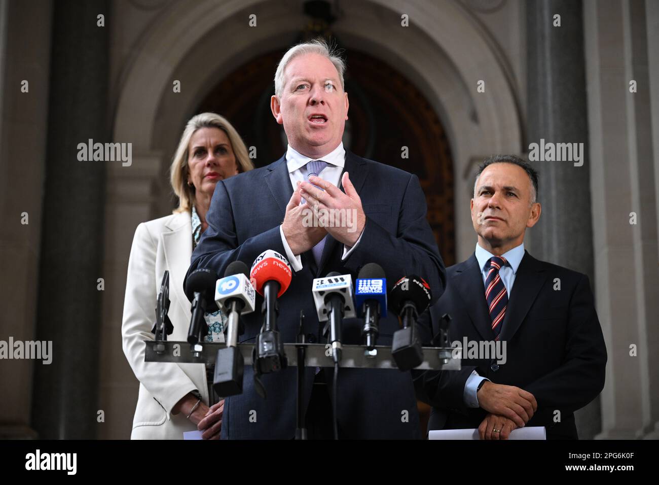 Liberal MP David Davis (centre) speaks to media during a press ...